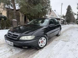 Melns Opel Omega 2001 Kauņa, ar dzinēja tilpumu 2.20 L un nobraukumu 290 tūkst. km par 1550 €, foto  vietnē AUTOMOTO.COM.LV