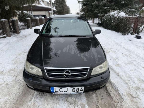 Melns Opel Omega 2001 Kauņa, ar dzinēja tilpumu 2.20 L un nobraukumu 290 tūkst. km par 1550 €, foto 2 vietnē AUTOMOTO.COM.LV
