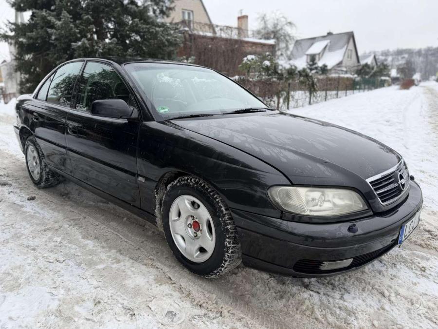 Melns Opel Omega 2001 Kauņa, ar dzinēja tilpumu 2.20 L un nobraukumu 290 tūkst. km par 1550 €, foto 4 vietnē AUTOMOTO.COM.LV