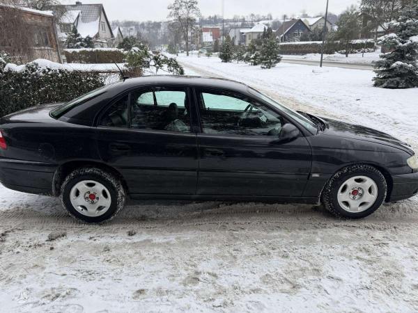 Melns Opel Omega 2001 Kauņa, ar dzinēja tilpumu 2.20 L un nobraukumu 290 tūkst. km par 1550 €, foto 7 vietnē AUTOMOTO.COM.LV