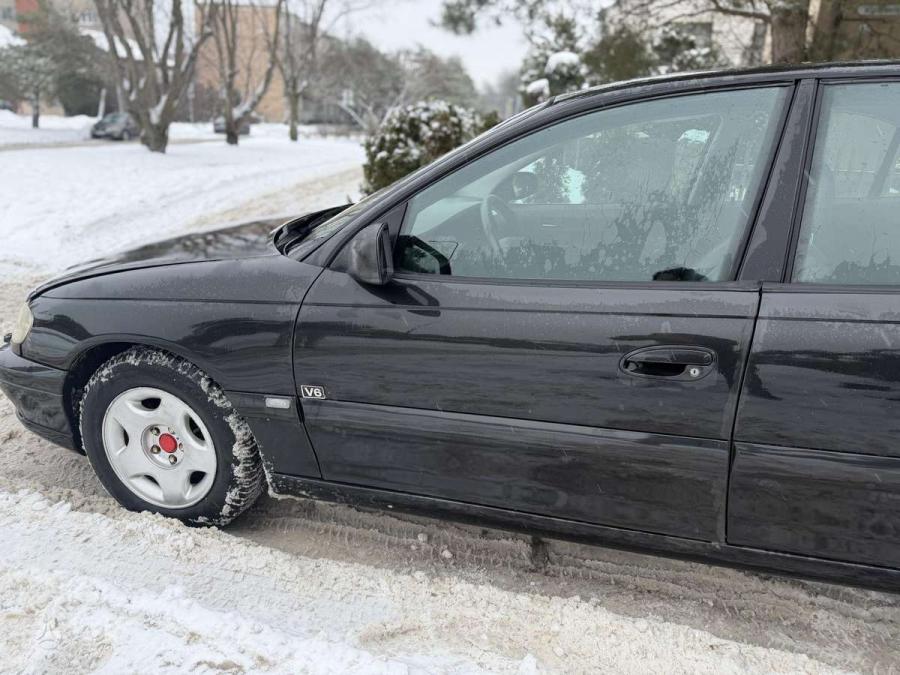 Melns Opel Omega 2001 Kauņa, ar dzinēja tilpumu 2.20 L un nobraukumu 290 tūkst. km par 1550 €, foto 13 vietnē AUTOMOTO.COM.LV