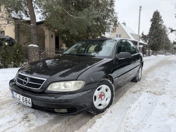 Melns Opel Omega 2001 Kauņa, ar dzinēja tilpumu 2.20 L un nobraukumu 288 tūkst. km par 1550 €, foto 1 vietnē AUTOMOTO.COM.LV