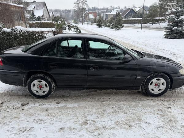 Melns Opel Omega 2001 Kauņa, ar dzinēja tilpumu 2.20 L un nobraukumu 288 tūkst. km par 1550 €, foto 7 vietnē AUTOMOTO.COM.LV