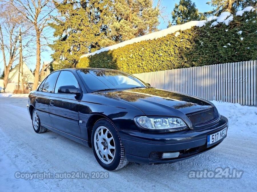 Black Opel Omega 2001 in Tallinn, with an engine capacity of 2.20 L and mileage of 336 thousand km for 1500 €, photo 1 on AUTOMOTO.COM.LV