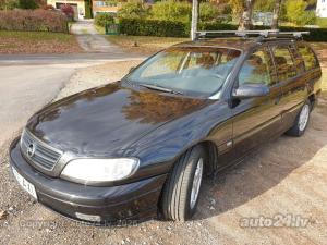 Melns Opel Omega 2001 Viljandi, ar dzinēja tilpumu 2.20 L un nobraukumu 200 tūkst. km par 2500 €, foto 2 vietnē AUTOMOTO.COM.LV
