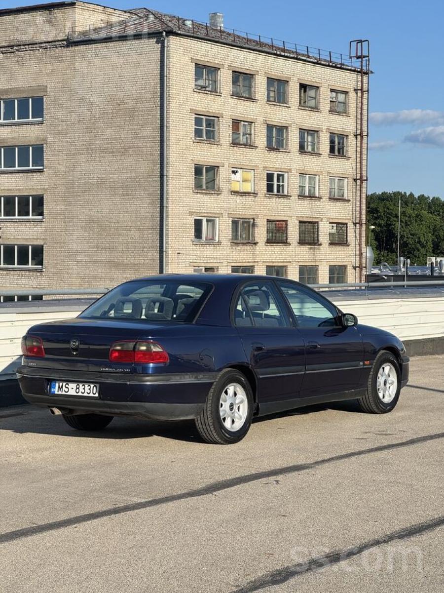 Blue Opel Omega 1996 in Riga, with an engine capacity of 2.50 L and mileage of 114 thousand km for 2000 €, photo 3 on AUTOMOTO.COM.LV