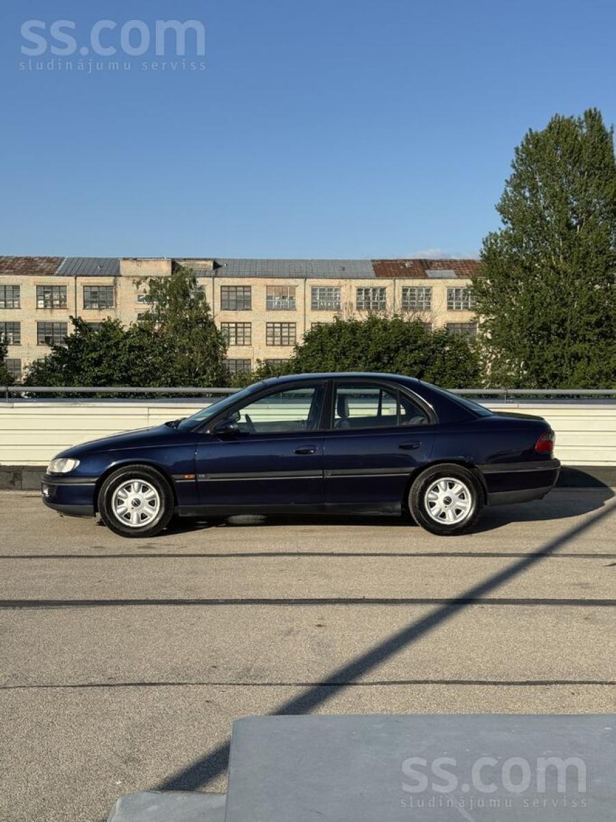 Blue Opel Omega 1996 in Riga, with an engine capacity of 2.50 L and mileage of 114 thousand km for 2000 €, photo 6 on AUTOMOTO.COM.LV