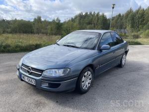 Zils Opel Omega 1998 Gulbene, ar dzinēja tilpumu 2.00 L un nobraukumu 197 tūkst. km par 1200 €, foto  vietnē AUTOMOTO.COM.LV