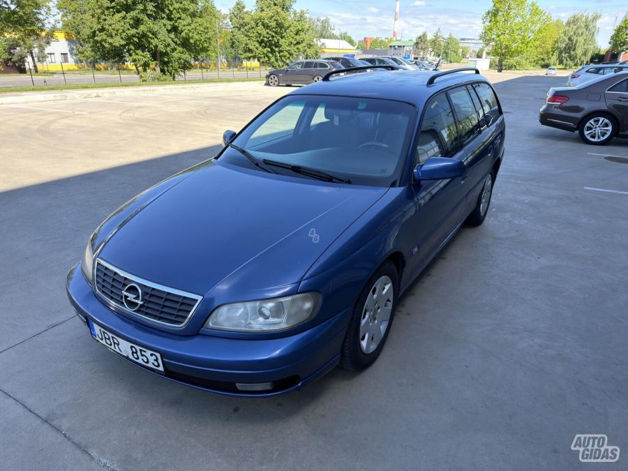 Zils Opel Omega 2002 Panevēža, ar dzinēja tilpumu 2.50 L un nobraukumu 317 tūkst. km par 1150 €, foto 5 vietnē AUTOMOTO.COM.LV