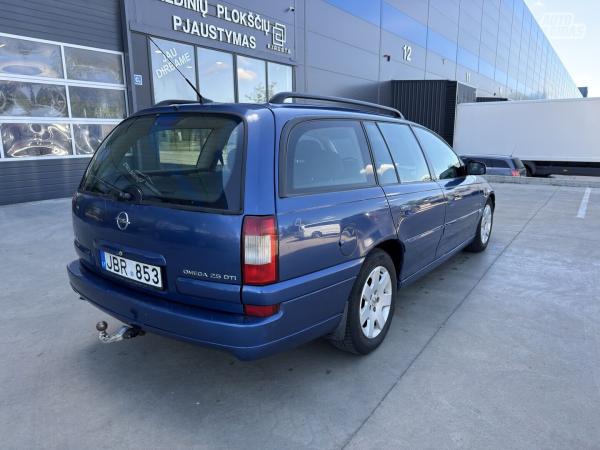 Blue Opel Omega 2002 in Panevezys, with an engine capacity of 2.50 L and mileage of 317 thousand km for 1150 €, photo 7 on AUTOMOTO.COM.LV