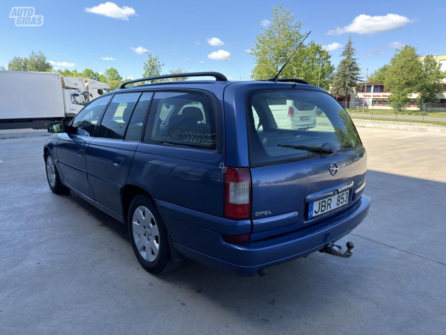 Zils Opel Omega 2002 Panevēža, ar dzinēja tilpumu 2.50 L un nobraukumu 317 tūkst. km par 1150 €, foto 9 vietnē AUTOMOTO.COM.LV
