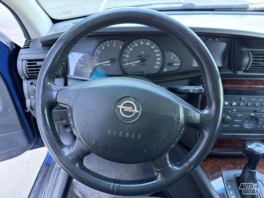 Zils Opel Omega 2002 Panevēža, ar dzinēja tilpumu 2.50 L un nobraukumu 317 tūkst. km par 1150 €, foto 20 vietnē AUTOMOTO.COM.LV