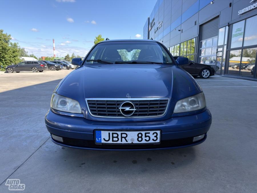 Zils Opel Omega 2002 Panevēža, ar dzinēja tilpumu 2.50 L un nobraukumu 317 tūkst. km par 1150 €, foto 6 vietnē AUTOMOTO.COM.LV