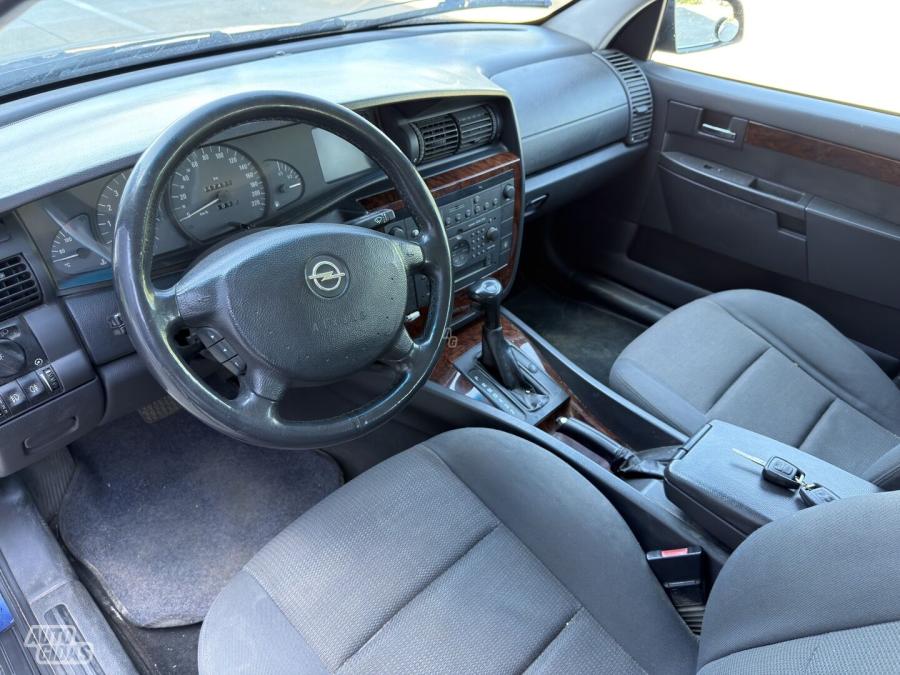 Zils Opel Omega 2002 Panevēža, ar dzinēja tilpumu 2.50 L un nobraukumu 317 tūkst. km par 1150 €, foto 14 vietnē AUTOMOTO.COM.LV