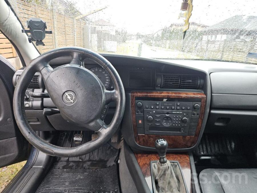 Blue Opel Omega 2003 in Bauska, with an engine capacity of 2.20 L and mileage of 381 thousand km for 500 €, photo 4 on AUTOMOTO.COM.LV