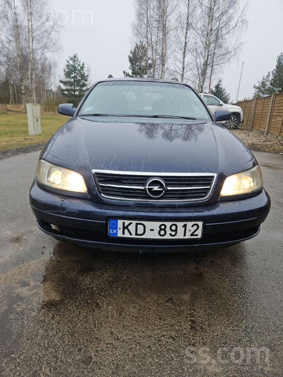 Blue Opel Omega 2003 in Bauska, with an engine capacity of 2.20 L and mileage of 381 thousand km for 500 €, photo 5 on AUTOMOTO.COM.LV