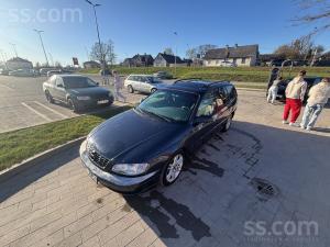 Zils Opel Omega 2003 Rīga, ar dzinēja tilpumu 2.50 L un nobraukumu 300 tūkst. km par 800 €, foto  vietnē AUTOMOTO.COM.LV