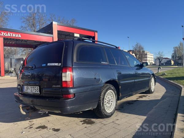 Синий Опель Омега 2003 в Рига, объемом двигателя 2.50 л и пробегом 300 тыс. км за 800 €, фото 2 на AUTOMOTO.COM.LV