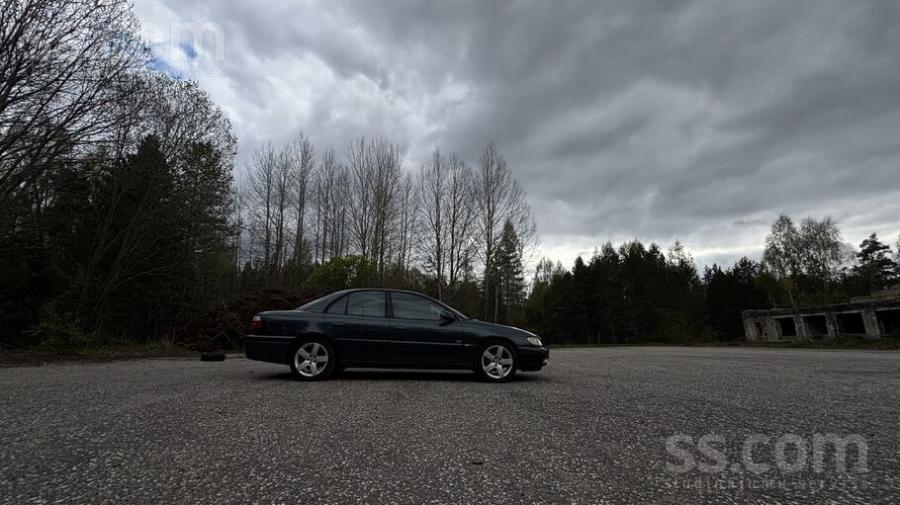 Green Opel Omega 2001 in Valmiera, with an engine capacity of 2.20 L and mileage of 251 thousand km for 900 €, photo 6 on AUTOMOTO.COM.LV