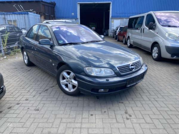 Green Opel Omega 2001 in Marijampole, with an engine capacity of 2.60 L and mileage of 171 thousand km for 3300 €, photo 1 on AUTOMOTO.COM.LV