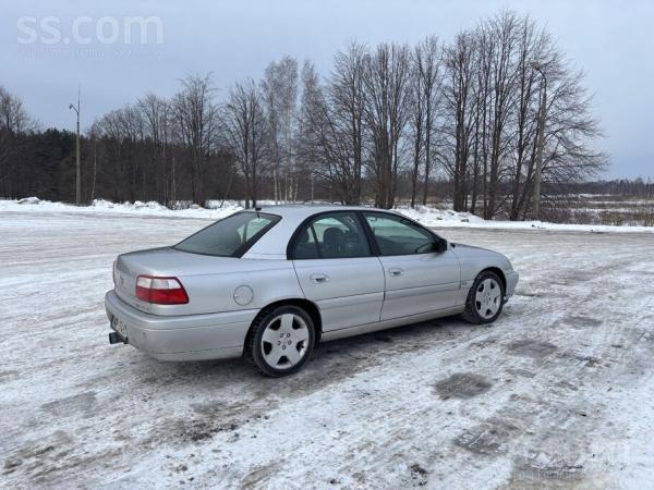 Pelēks Opel Omega 2000 Liepāja, ar dzinēja tilpumu 3.00 L un nobraukumu 355 tūkst. km par 1700 €, foto 2 vietnē AUTOMOTO.COM.LV