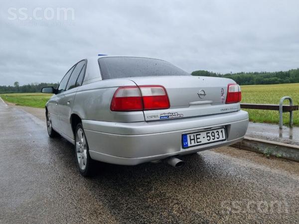 Grey Opel Omega 2000 in Ogre, with an engine capacity of 2.20 L and mileage of 200 thousand km for 1250 €, photo 4 on AUTOMOTO.COM.LV