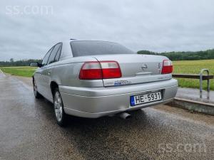 Grey Opel Omega 2000 in Ogre, with an engine capacity of 2.20 L and mileage of 200 thousand km for 1250 €, photo 5 on AUTOMOTO.COM.LV
