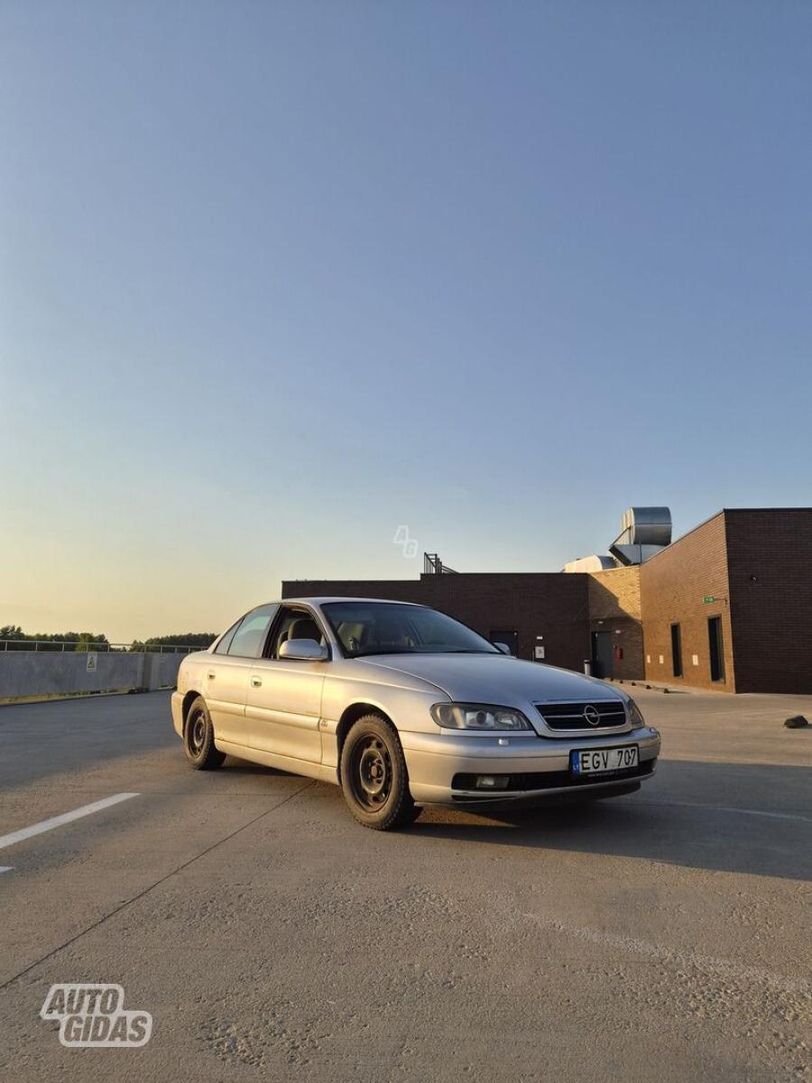 Pelēks Opel Omega 2000 Viļņa, ar dzinēja tilpumu 2.20 L un nobraukumu 409 tūkst. km par 600 €, foto 1 vietnē AUTOMOTO.COM.LV