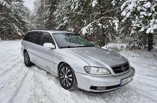 Grey Opel Omega 2002 in Vilnius, with an engine capacity of 2.17 L and mileage of 285 thousand km for 999 €, photo 4 on AUTOMOTO.COM.LV