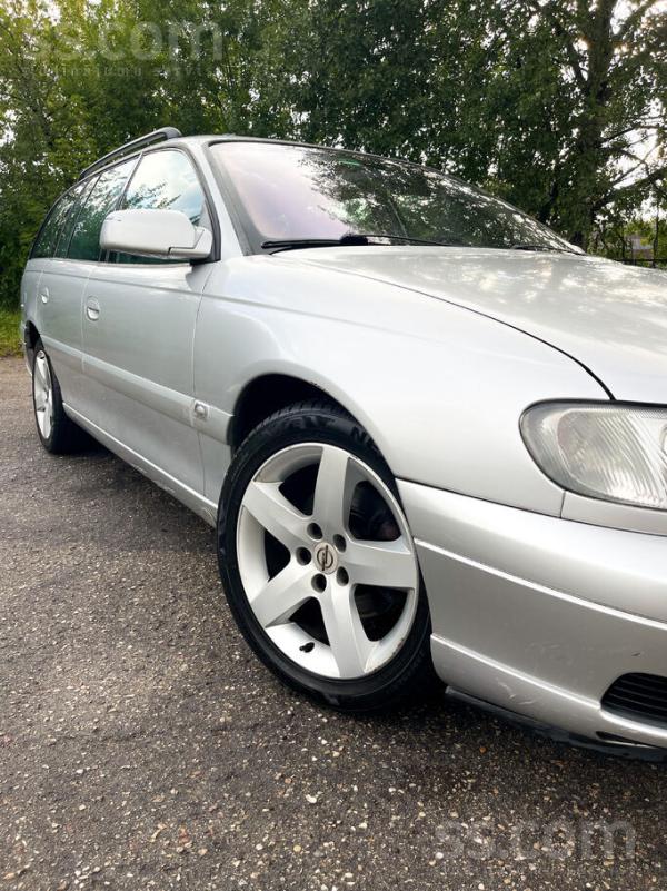 Grey Opel Omega 2002 in Ogre, with an engine capacity of 2.60 L and mileage of 212 thousand km for 2250 €, photo 6 on AUTOMOTO.COM.LV