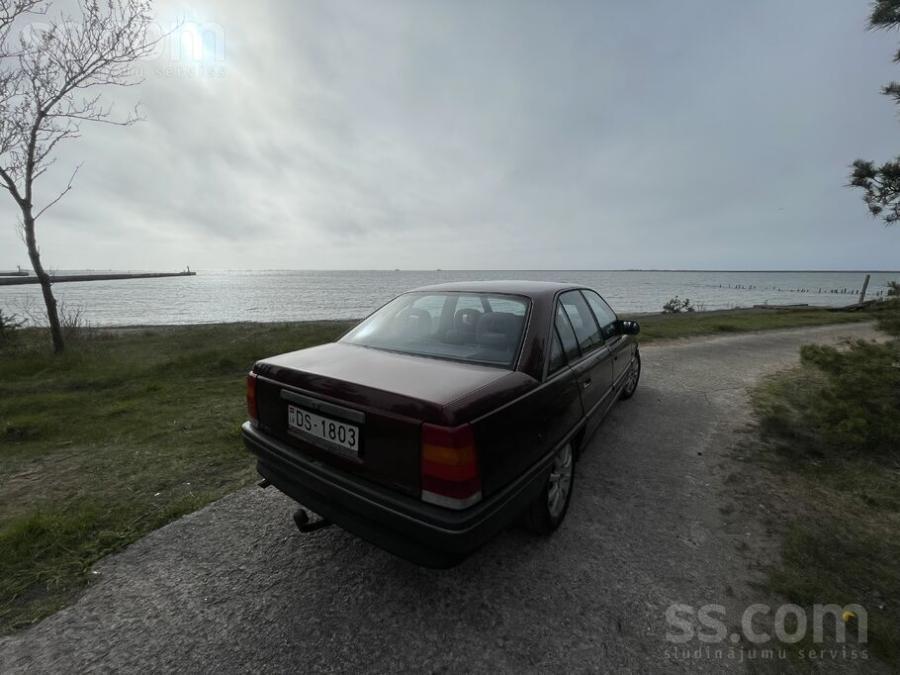 Sarkans Opel Omega 1988 Liepāja, ar dzinēja tilpumu 2.00 L un nobraukumu 254 tūkst. km par 2400 €, foto 1 vietnē AUTOMOTO.COM.LV