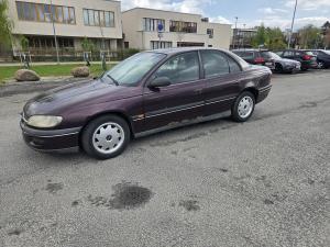 Red Opel Omega 1994 in Tallinn, with an engine capacity of 2.00 L and mileage of 256 thousand km for 500 €, photo 3 on AUTOMOTO.COM.LV