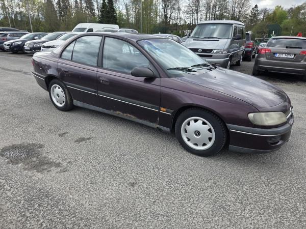 Sarkans Opel Omega 1994 Tallina, ar dzinēja tilpumu 2.00 L un nobraukumu 256 tūkst. km par 500 €, foto 6 vietnē AUTOMOTO.COM.LV