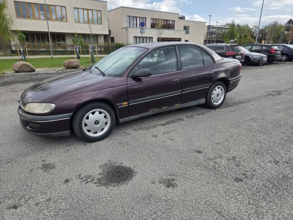 Sarkans Opel Omega 1994 Tallina, ar dzinēja tilpumu 2.00 L un nobraukumu 256 tūkst. km par 500 €, foto 7 vietnē AUTOMOTO.COM.LV
