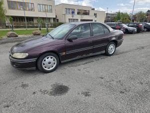 Red Opel Omega 1994 in Tallinn, with an engine capacity of 2.00 L and mileage of 256 thousand km for 500 €, photo 7 on AUTOMOTO.COM.LV