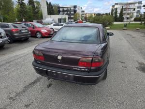 Red Opel Omega 1994 in Tallinn, with an engine capacity of 2.00 L and mileage of 256 thousand km for 500 €, photo 8 on AUTOMOTO.COM.LV
