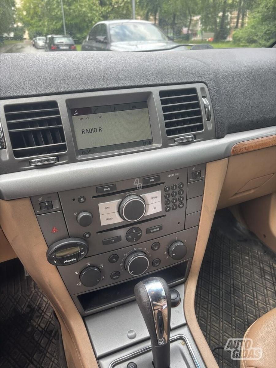 Black Opel Signum 2006 in Vilnius, with an engine capacity of 1.90 L and mileage of 313 thousand km for 800 €, photo 12 on AUTOMOTO.COM.LV