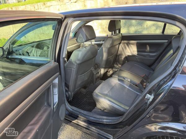 Black Opel Signum 2006 in Klaipeda, with an engine capacity of 1.90 L and mileage of 335 thousand km for 1650 €, photo 10 on AUTOMOTO.COM.LV