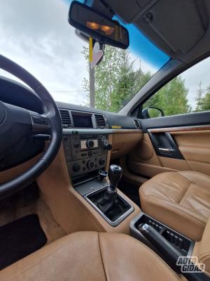 Blue Opel Signum 2007 in Kaunas, with an engine capacity of 1.90 L and mileage of 289 thousand km for 2000 €, photo 12 on AUTOMOTO.COM.LV