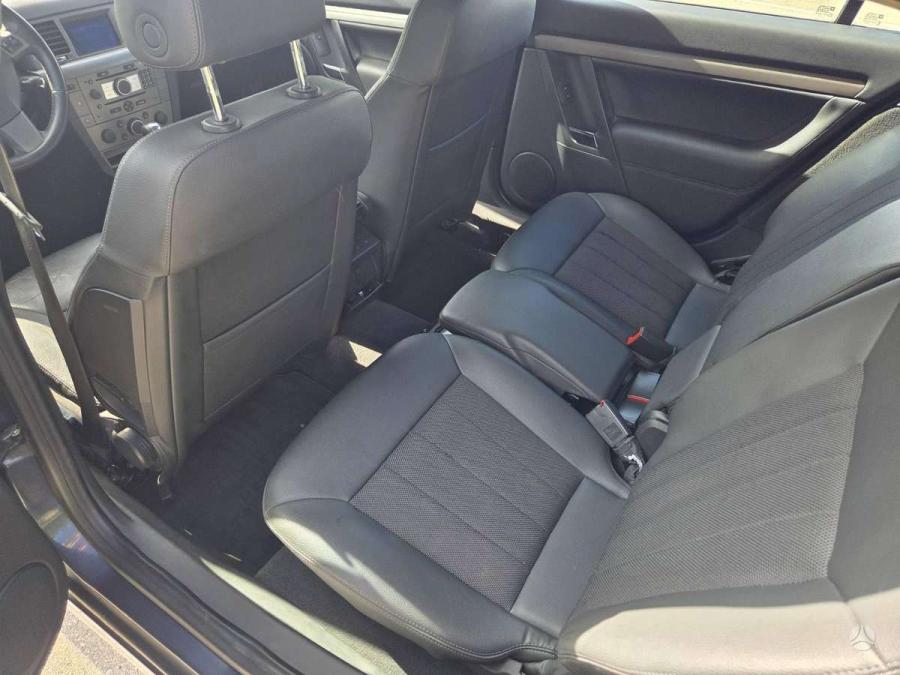 Blue Opel Signum 2008 in Kaisiadorys, with an engine capacity of 1.91 L and mileage of 237 thousand km for 2350 €, photo 14 on AUTOMOTO.COM.LV