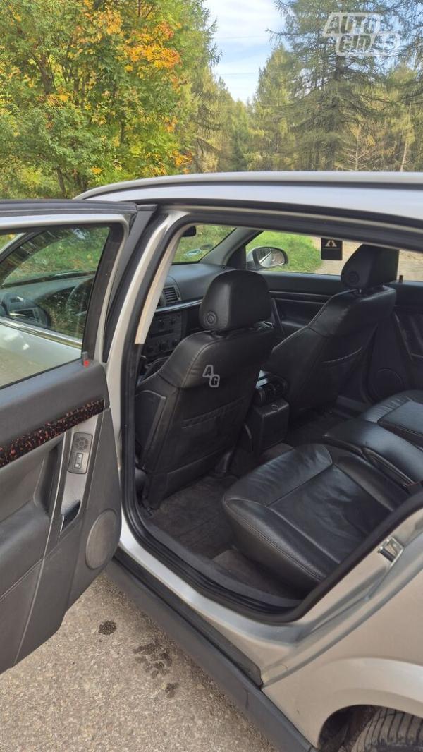 Grey Opel Signum 2004 in Alytus, with an engine capacity of 2.20 L and mileage of 396 thousand km for 995 €, photo 11 on AUTOMOTO.COM.LV