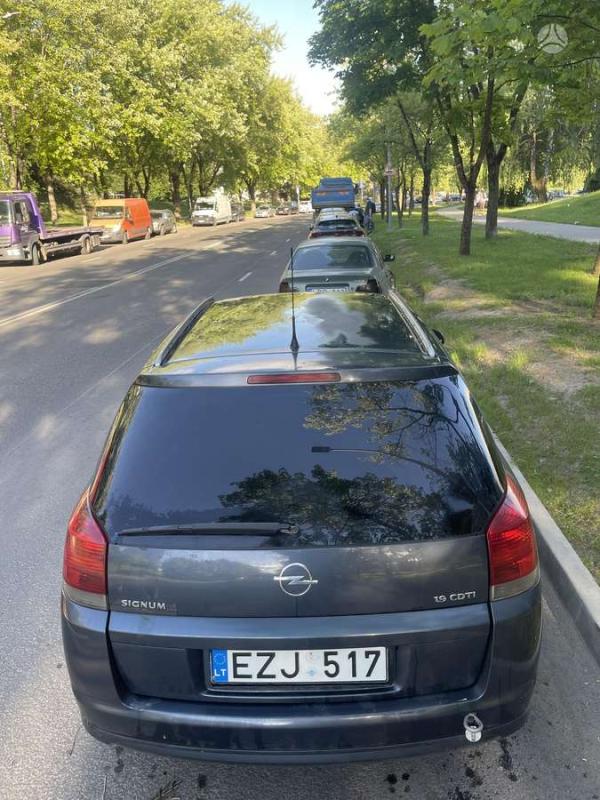 Violet Opel Signum 2010 in Vilnius, with an engine capacity of 1.90 L and mileage of 308 thousand km for 900 €, photo 6 on AUTOMOTO.COM.LV