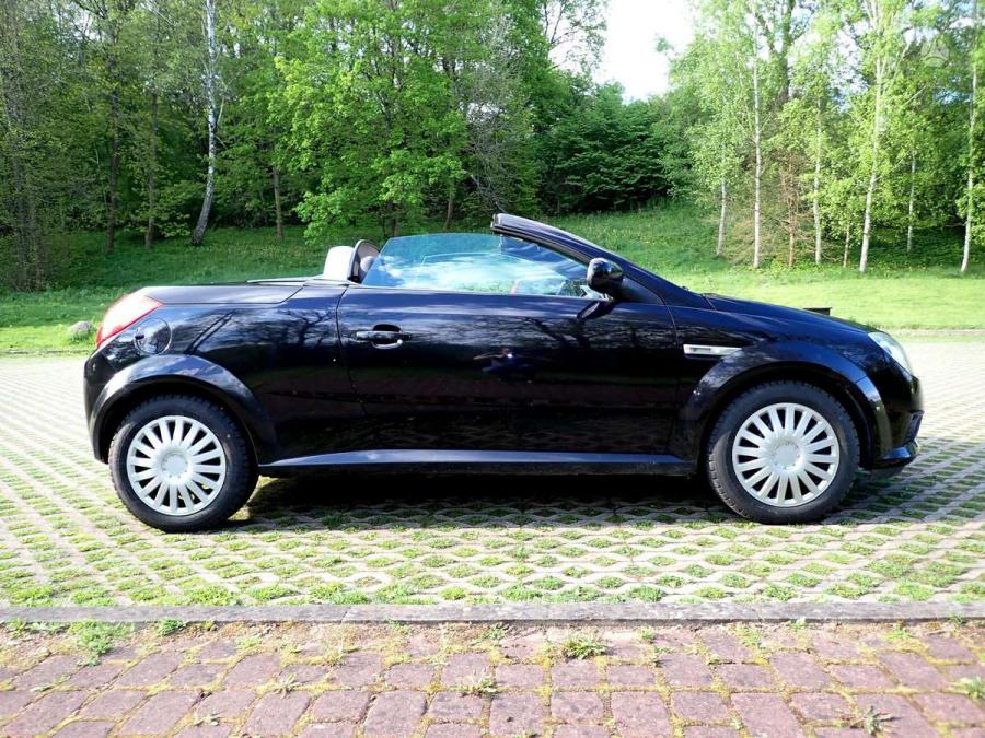 Melns Opel Tigra 2005 Viļņa, ar dzinēja tilpumu 1.36 L un nobraukumu 144 tūkst. km par 1100 €, foto 6 vietnē AUTOMOTO.COM.LV