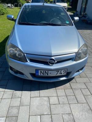 Zils Opel Tigra 2005 Alūksne, ar dzinēja tilpumu 1.40 L un nobraukumu 164 tūkst. km par 2400 €, foto  vietnē AUTOMOTO.COM.LV