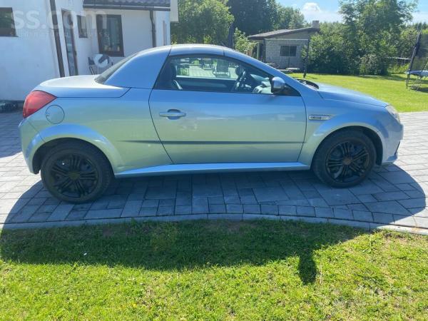 Zils Opel Tigra 2005 Alūksne, ar dzinēja tilpumu 1.40 L un nobraukumu 164 tūkst. km par 2400 €, foto 4 vietnē AUTOMOTO.COM.LV