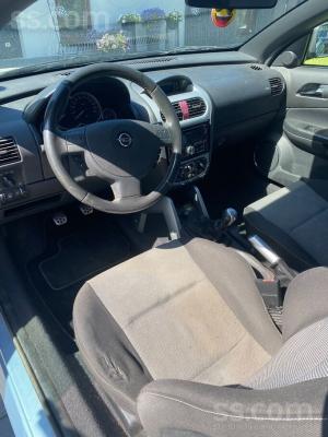 Zils Opel Tigra 2005 Alūksne, ar dzinēja tilpumu 1.40 L un nobraukumu 164 tūkst. km par 2400 €, foto 8 vietnē AUTOMOTO.COM.LV