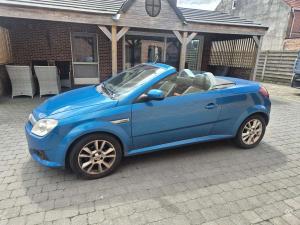 Zils Opel Tigra 2006 Šauļi, ar dzinēja tilpumu 1.30 L un nobraukumu 196 tūkst. km par 1200 €, foto 3 vietnē AUTOMOTO.COM.LV