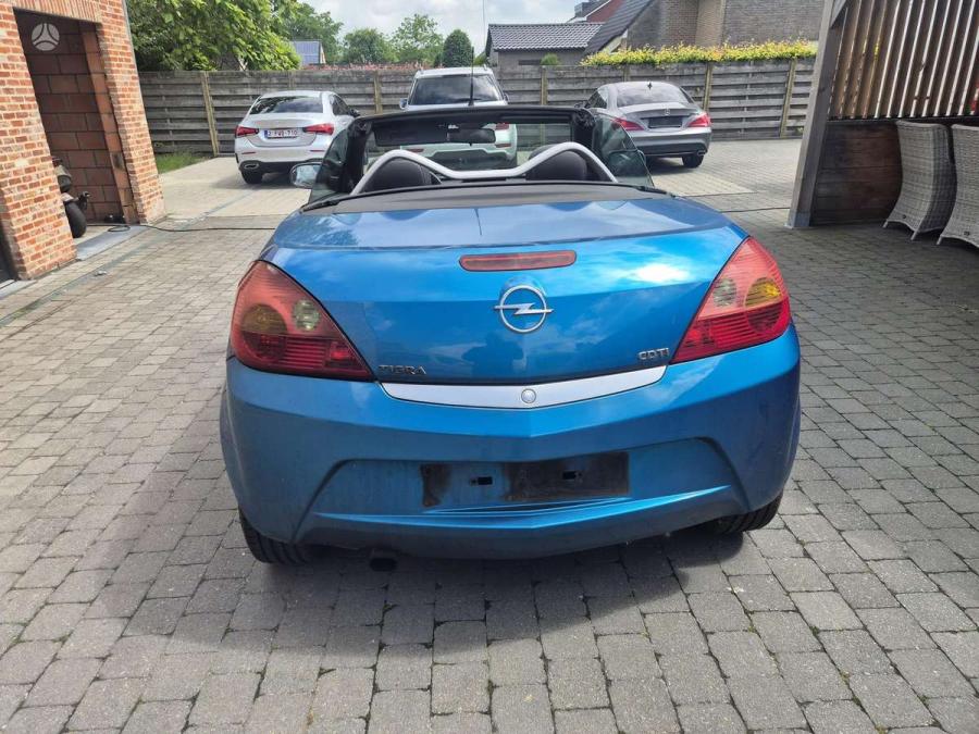 Zils Opel Tigra 2006 Šauļi, ar dzinēja tilpumu 1.30 L un nobraukumu 196 tūkst. km par 1200 €, foto 5 vietnē AUTOMOTO.COM.LV