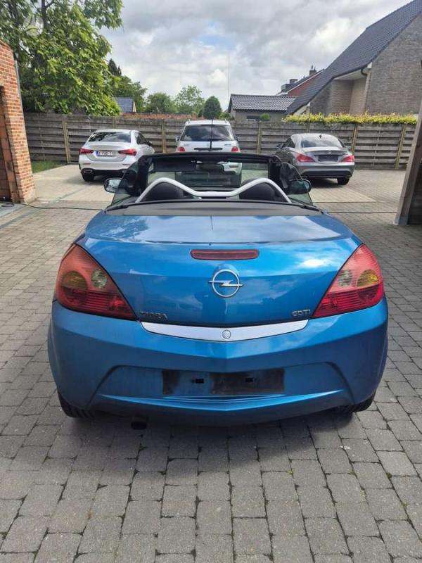 Zils Opel Tigra 2006 Šauļi, ar dzinēja tilpumu 1.30 L un nobraukumu 196 tūkst. km par 1200 €, foto 9 vietnē AUTOMOTO.COM.LV