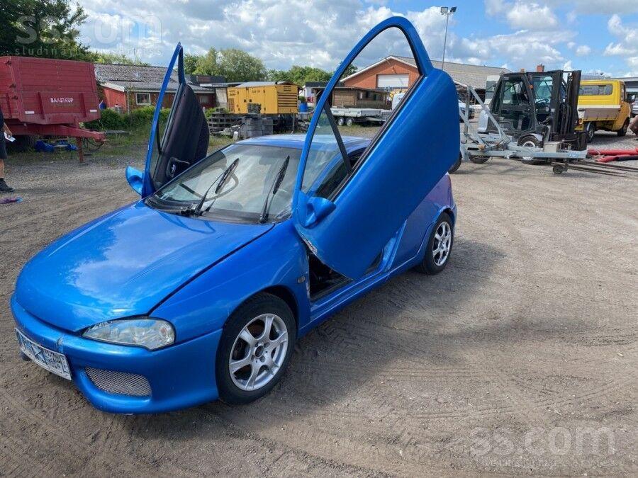 Zils Opel Tigra 1995 Rīga, ar dzinēja tilpumu 2.00 L un nobraukumu 214 tūkst. km par 900 €, foto 2 vietnē AUTOMOTO.COM.LV